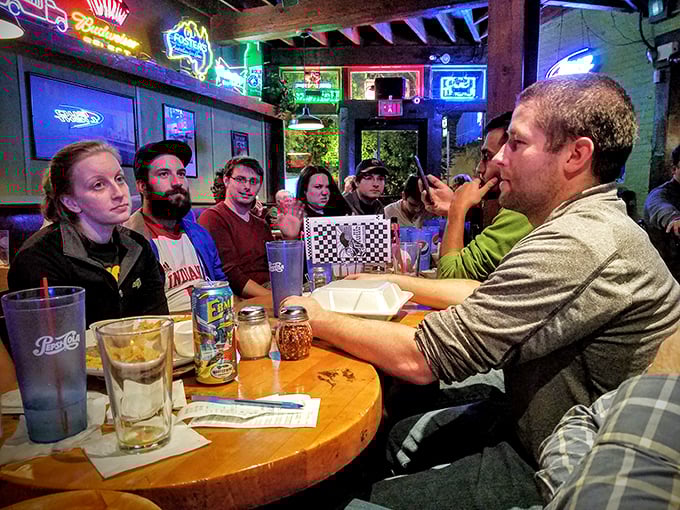 This isn't just a table of diners&mdash;it's a snapshot of community happening over pints and pies in Dayton's favorite gathering spot.