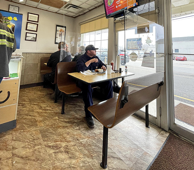 Window seats where regulars become family and first-timers become regulars. The Cincinnati chicken cult welcomes new members daily.