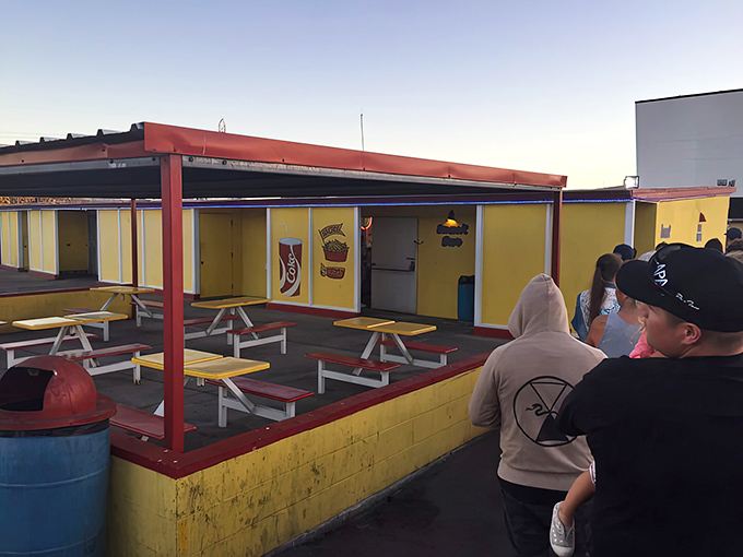 The indoor dining area provides refuge for those who prefer their movies with walls and a roof.