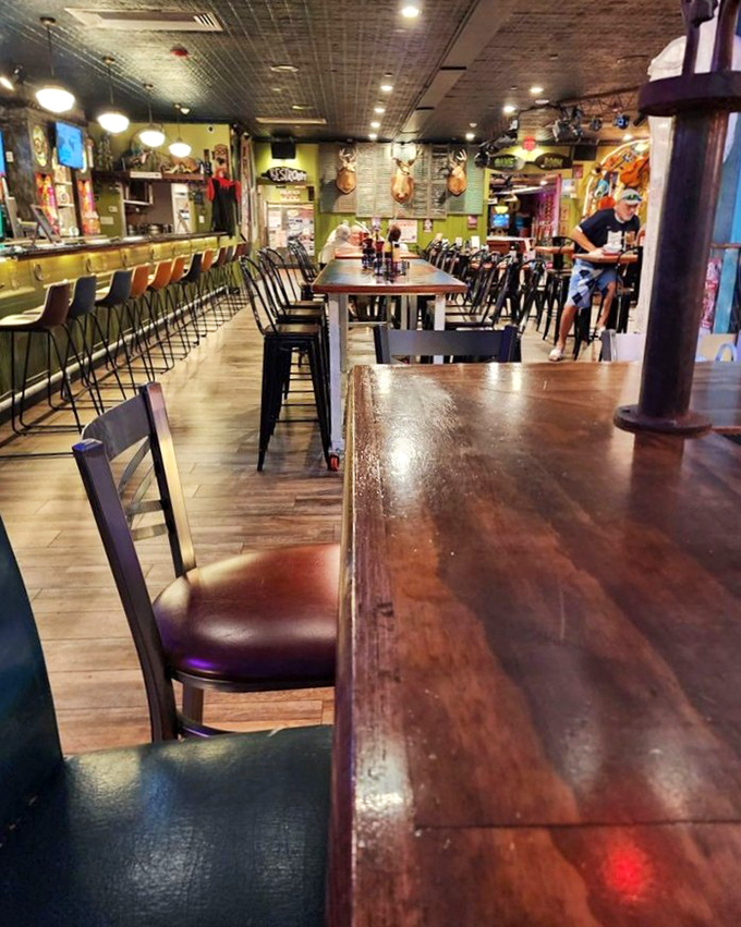 The dining room's warm wood tones and comfortable seating invite you to settle in for the long haul. No rushing through meals here.