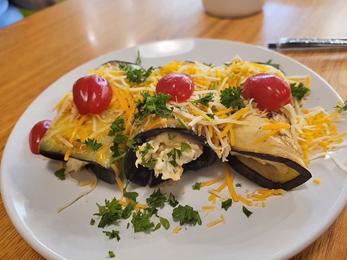 These eggplant rolls are dressed to impress with their cheese tuxedos and cherry tomato cufflinks. Vegetarian food that makes carnivores jealous.