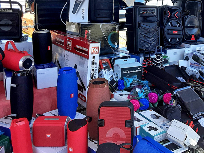 A tech lover's dream table filled with speakers and gadgets. Yesterday's cutting-edge electronics at prices that won't cut into your budget.