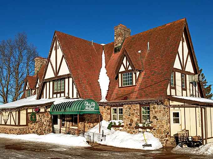 The Elk & Hound's Tudor architecture and snow-covered entrance promises the kind of cozy dining experience worth brushing off your snow boots for.