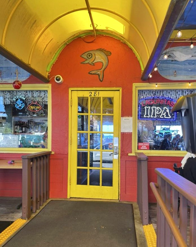 The yellow door framed by red walls and neon beer signs&mdash;a portal to seafood nirvana. Like following the yellow brick road, but it leads to fish instead of wizards.
