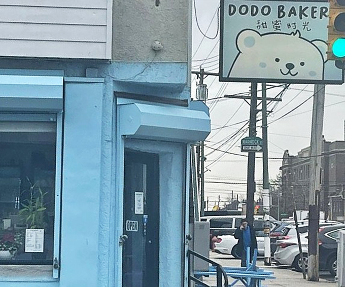 The entrance to Dodo Bakery: where the blue exterior serves as a portal to a world of Asian-inspired pastry perfection.