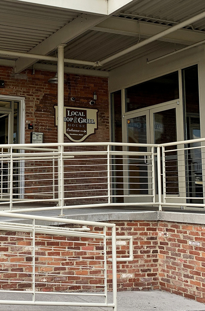 The entrance that promises delicious adventures ahead. Simple signage on historic brick&mdash;because when your reputation is this good, you don't need neon lights.