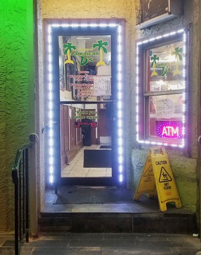 The entrance glows like a beacon of culinary hope. Those LED lights aren't just decoration&mdash;they're guiding hungry souls to Caribbean bliss.