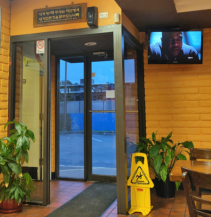 Your gateway to Korean fried chicken enlightenment starts right here at this unassuming entrance.