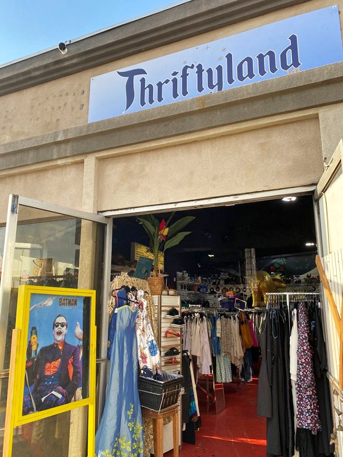 The storefront's simple sign and yellow-framed Batman poster create the perfect low-key entrance to this treasure-hunting paradise.