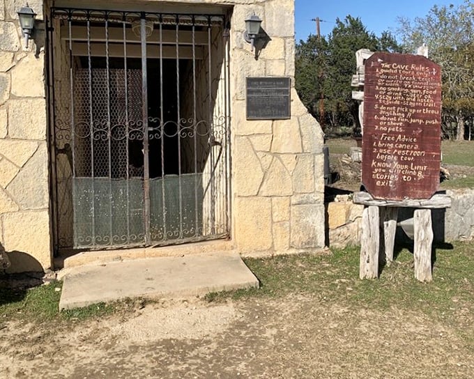 The unassuming entrance gives no hint of the wonders below. Like a book with a plain cover hiding an epic story, this doorway conceals geological magic.