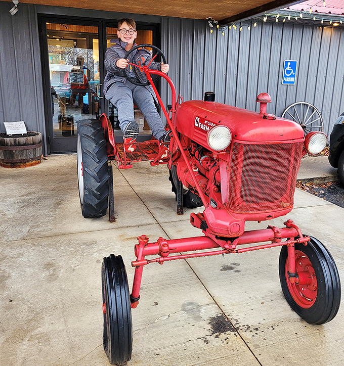 Nothing says "authentic farm-to-table" quite like an actual vintage tractor out front. This Farmall Cub is the restaurant's unofficial greeter and Instagram star.