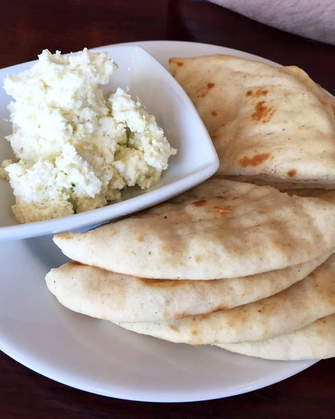 Pillowy pita triangles surrounding a cloud of feta spread&mdash;a simple starter that's caused more than one dinner guest to forget about the main course.