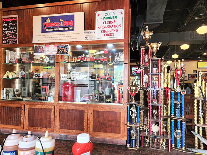 Trophies that tell the tale of BBQ battles won. When your restaurant collects hardware like this, you know they're not just blowing smoke.