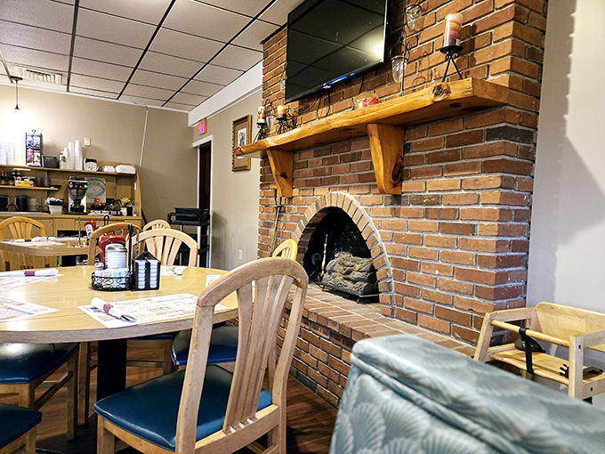 A brick fireplace adds unexpected warmth to the dining experience. Even when not lit, it radiates that "grandma's house" feeling we all crave.