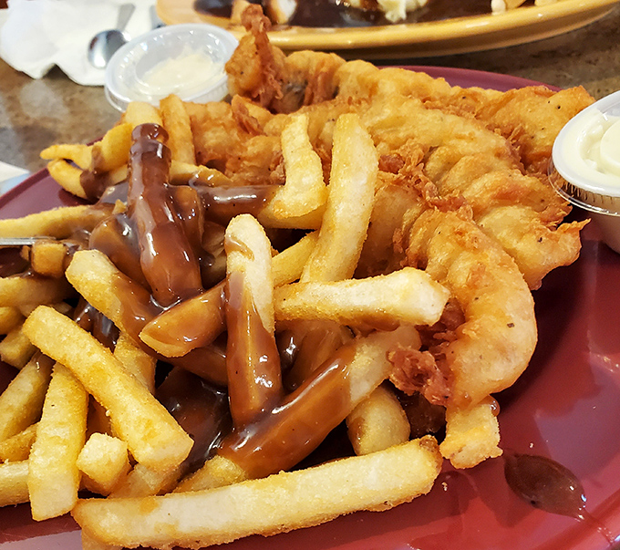 Fish and fries swimming in gravy&mdash;comfort food that speaks the universal language of "you deserve this deliciousness today."