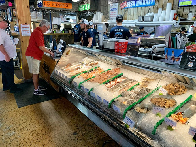 The fish market display case &ndash; where tomorrow's Instagram food photos begin their journey. From Gulf to plate in record time.