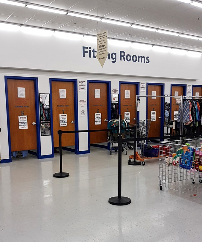 The fitting room corridor stands ready for fashion experiments and honest mirror moments&mdash;where thrift store gambles become wardrobe winners.