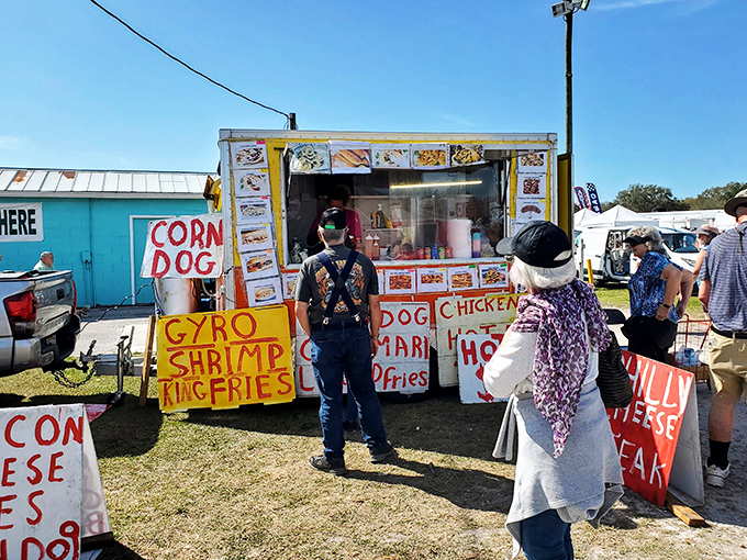 The universal language of street food speaks fluently here. Gyros, corn dogs, and cheese steaks&mdash;the holy trinity of flea market fuel.