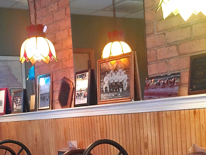 Framed photographs line the walls, telling stories of community history and creating that sense of belonging that chain restaurants can never replicate.