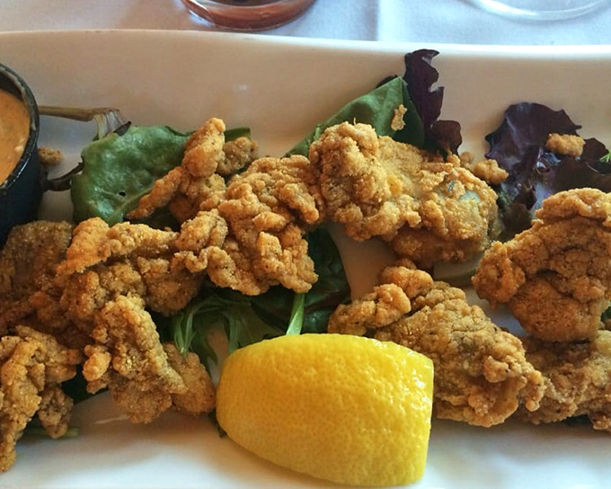Fried oysters that crackle with cornmeal coating, while maintaining their ocean-kissed tenderness within&mdash;the seafood equivalent of a perfect contradiction.