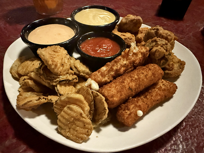 The fried sampler platter – where indecision becomes a virtue and "I'll just have one bite" becomes the lie you tell yourself.