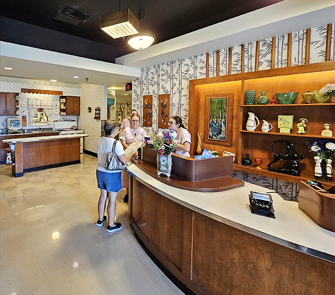 The reception area doesn't just welcome you&mdash;it adopts you. Wood paneling and vintage knick-knacks set the stage for the family dinner theater to come.