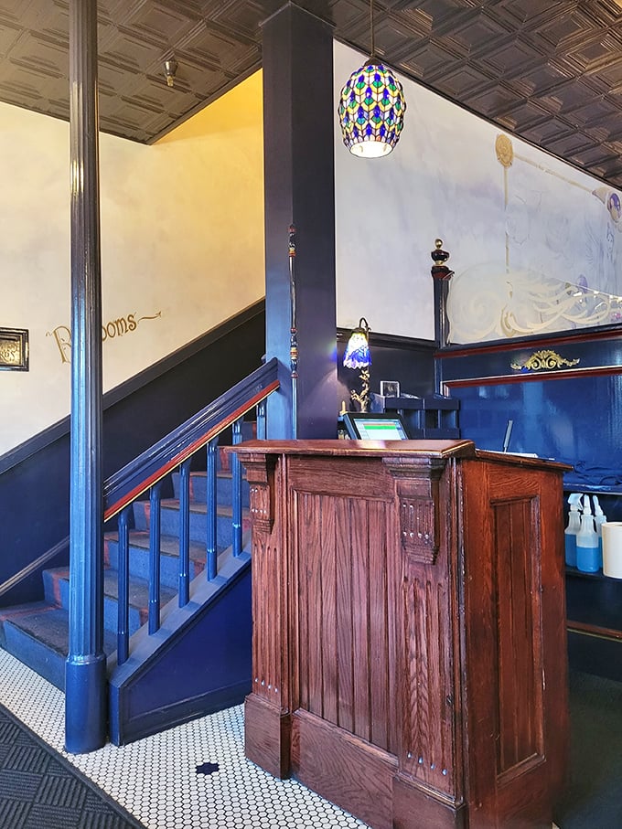 The host stand welcomes you with old-world charm, while stained glass pendants cast jewel-toned light on your path to culinary happiness.