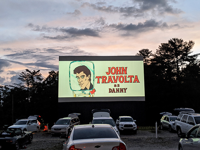 A vintage cartoon intro plays across the massive screen, transporting viewers to a time when animation was hand-drawn and movie snacks didn't require a second mortgage.