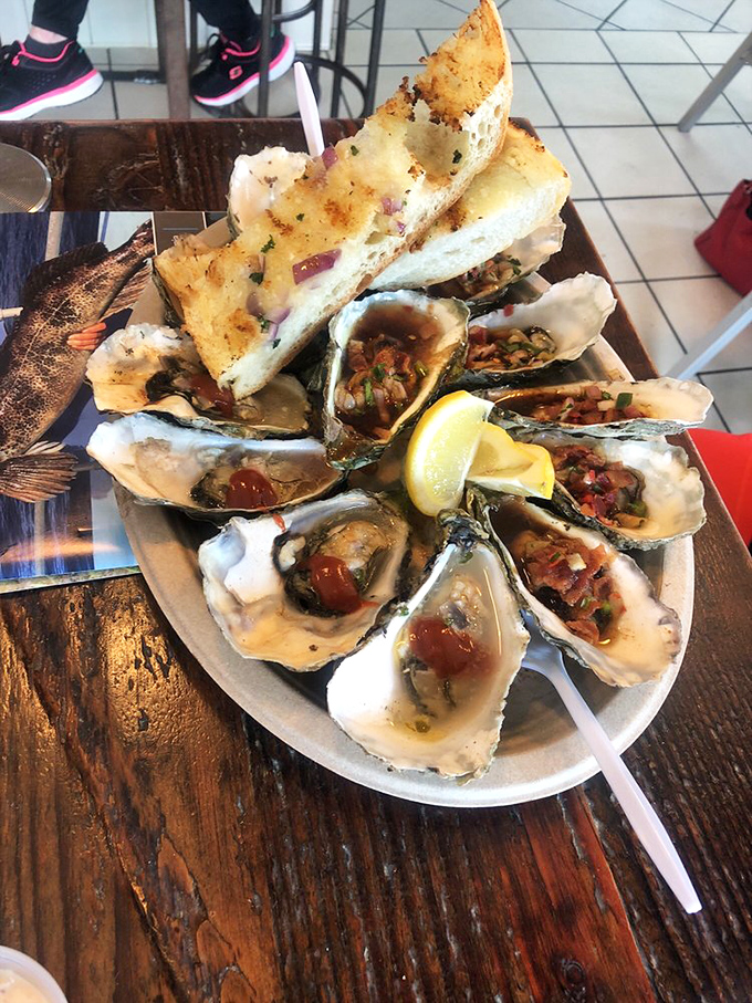 Oysters that make you want to write poetry. Briny, buttery treasures on the half-shell that taste like the ocean's finest love letter.