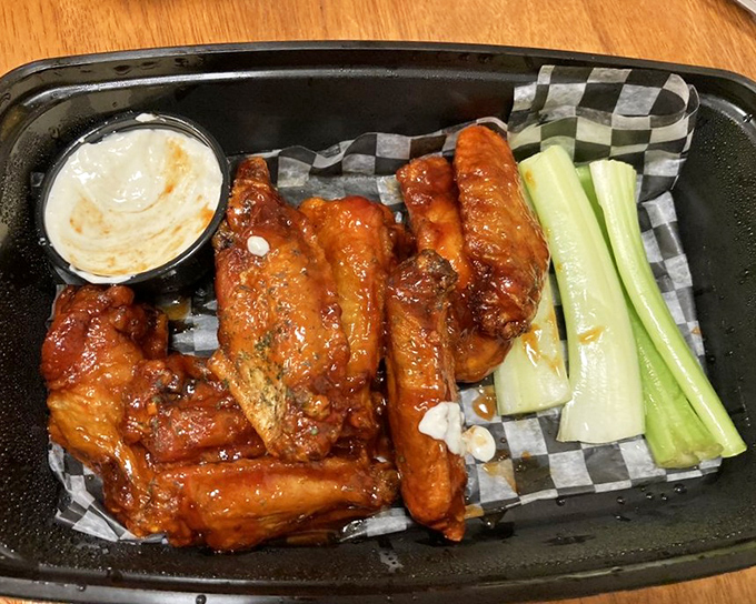 Wings that don't need a sporting event as an excuse&mdash;glazed with tangy sauce and served with the obligatory celery that nobody actually eats.