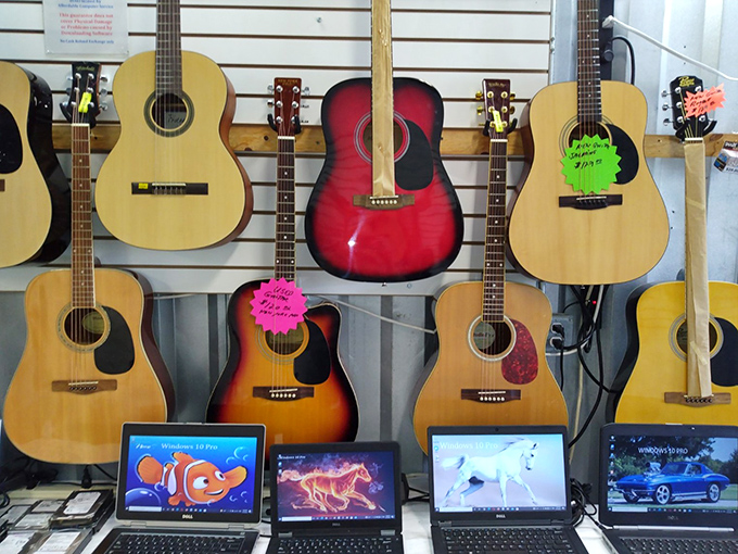 Aspiring musicians and seasoned players alike find common ground at this guitar wall, where instruments wait patiently for their next song.