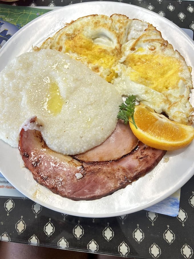 Ham, grits, and eggs prepared with the kind of care that makes breakfast feel ceremonial.