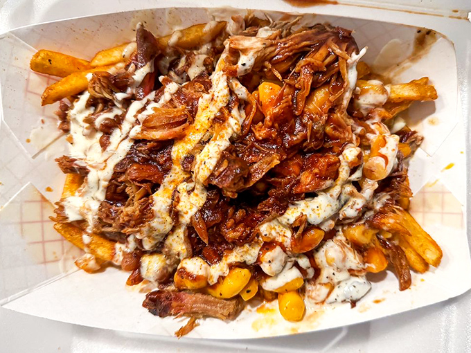 The Hoffanator&mdash;not just a sandwich but an engineering marvel where pulled pork, sauce, and physics combine to create the perfect bite.