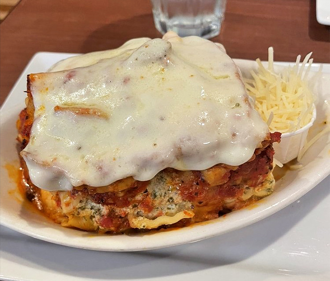 Lasagna that doesn't understand the concept of personal space &ndash; layers of cheese, sauce, and pasta in a beautiful boundary-crossing mess. Fork-ready comfort.