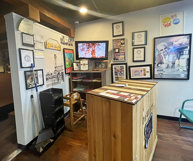 Awards and accolades line the walls, telling the story of a restaurant that's earned its reputation one perfectly cooked patty at a time.