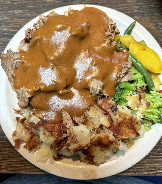 This hot sirloin sandwich isn't just lunch &ndash; it's therapy on a plate. The gravy alone could solve most of life's problems.