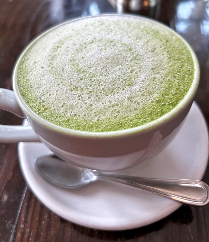 The matcha latte arrives looking like spring in a cup. That frothy top layer is begging to be Instagrammed before sipped.