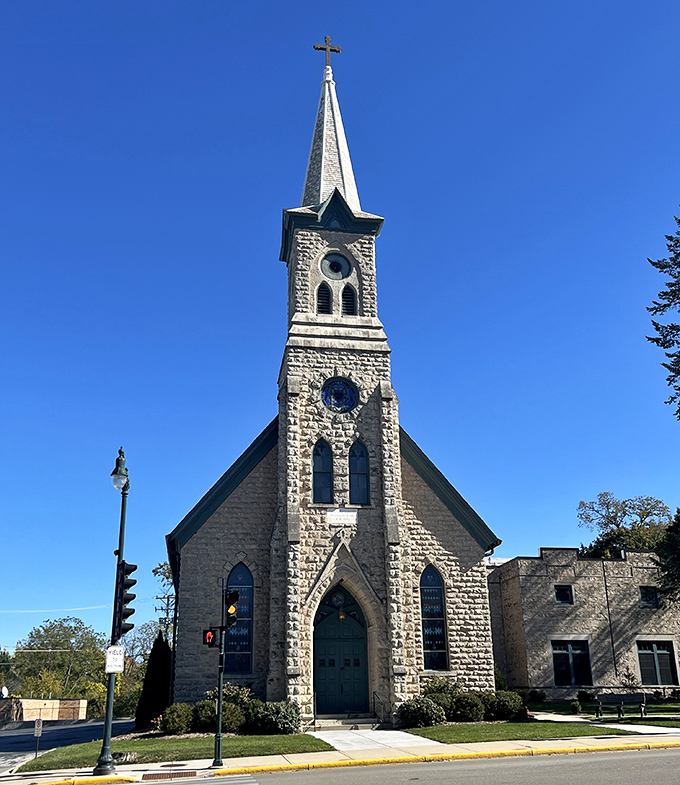 Immanuel Lutheran's limestone steeple reaches skyward like a spiritual exclamation point, anchoring the community in both faith and architectural beauty.