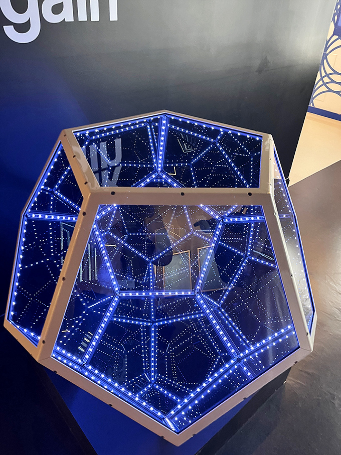 Step into the infinite with this mesmerizing dodecahedron light installation that creates the illusion of endless space within a geometric form.