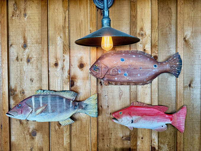 Whimsical fish art that reminds you exactly where your dinner was swimming before it landed on your plate. Tasteful nautical charm.