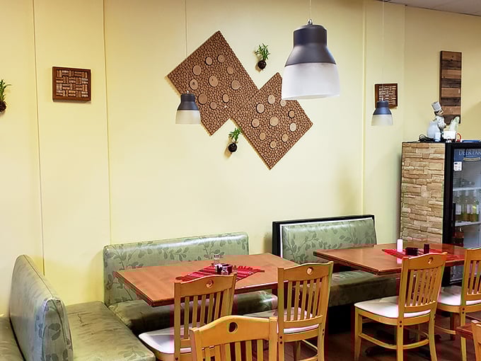 Warm yellow walls and thoughtful decor create an atmosphere that says, "You're not just a customer&mdash;you're our dinner guest."