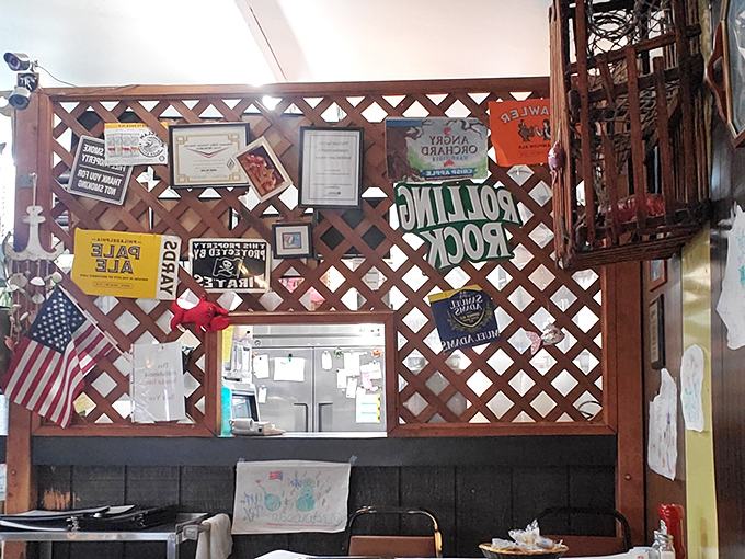 A lattice wall covered in memorabilia tells stories of fishing trips, loyal customers, and years of serving the community one seafood platter at a time.