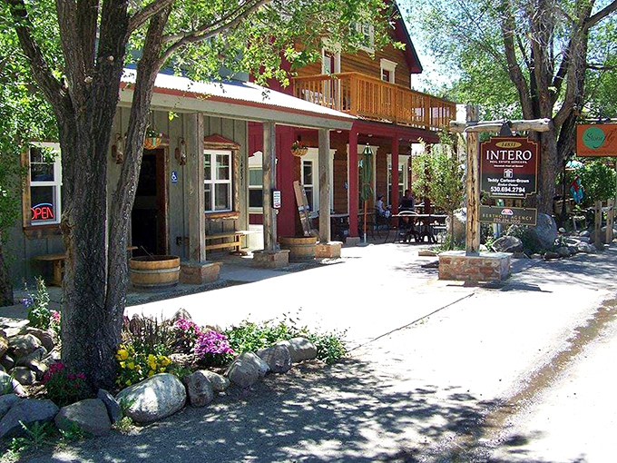 Colorful storefronts with wooden porches invite you to linger awhile. Those wine barrels aren't just for show—they're promising good times ahead.