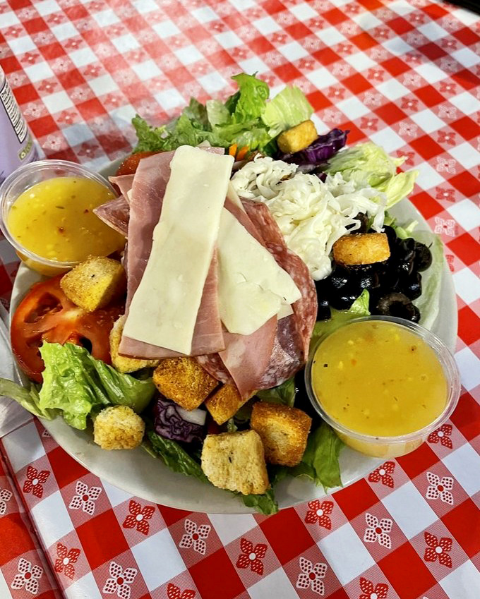 This antipasto plate arranges Italian classics like a edible symphony orchestra, perfectly harmonized and ready to perform.