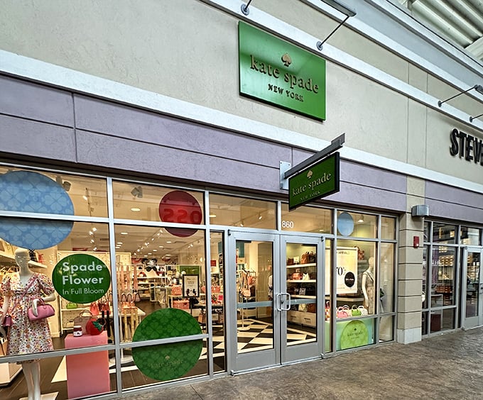 Kate Spade's playful elegance shines through colorful displays. Designer handbags and accessories that make splurging feel like a perfectly reasonable life choice.