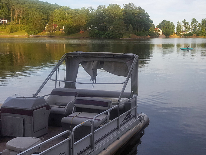 Paddling through liquid glass while the world's problems shrink to kayak-sized proportions.