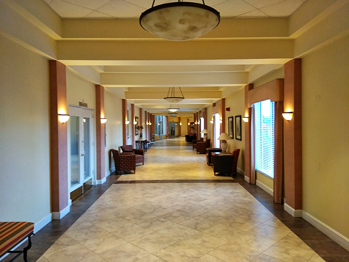 Elegant hallways connect activity spaces &ndash; wide enough for golf cart gossip sessions and impromptu neighbor reunions.