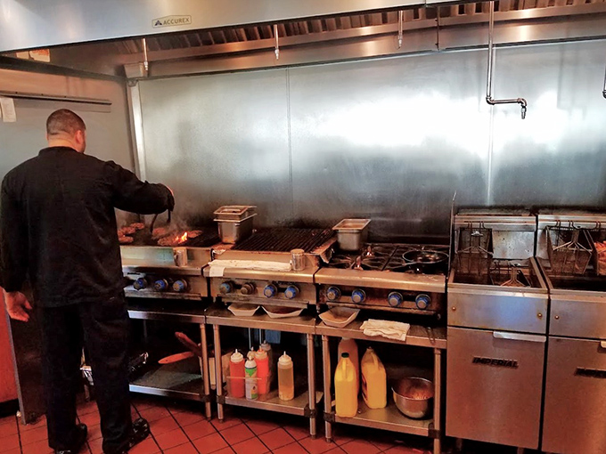 Where the magic happens: a gleaming kitchen battlefield where burgers are transformed from mere ingredients into legends.