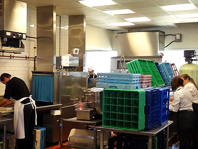 Behind the scenes, the kitchen hums with purpose. This is where the magic happens&mdash;where recipes passed down through generations come to life.