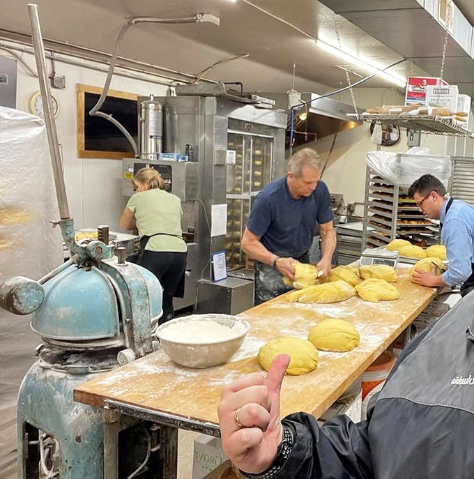 This kitchen operates like a well-oiled machine where flour flies and dreams come true, one perfectly crafted donut at a time.